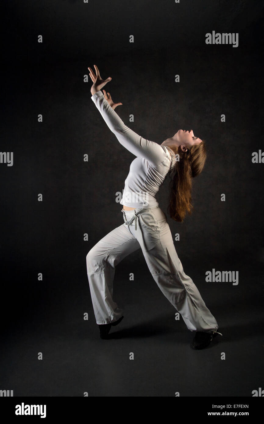 Against gray wall hi-res stock photography and images - Alamy