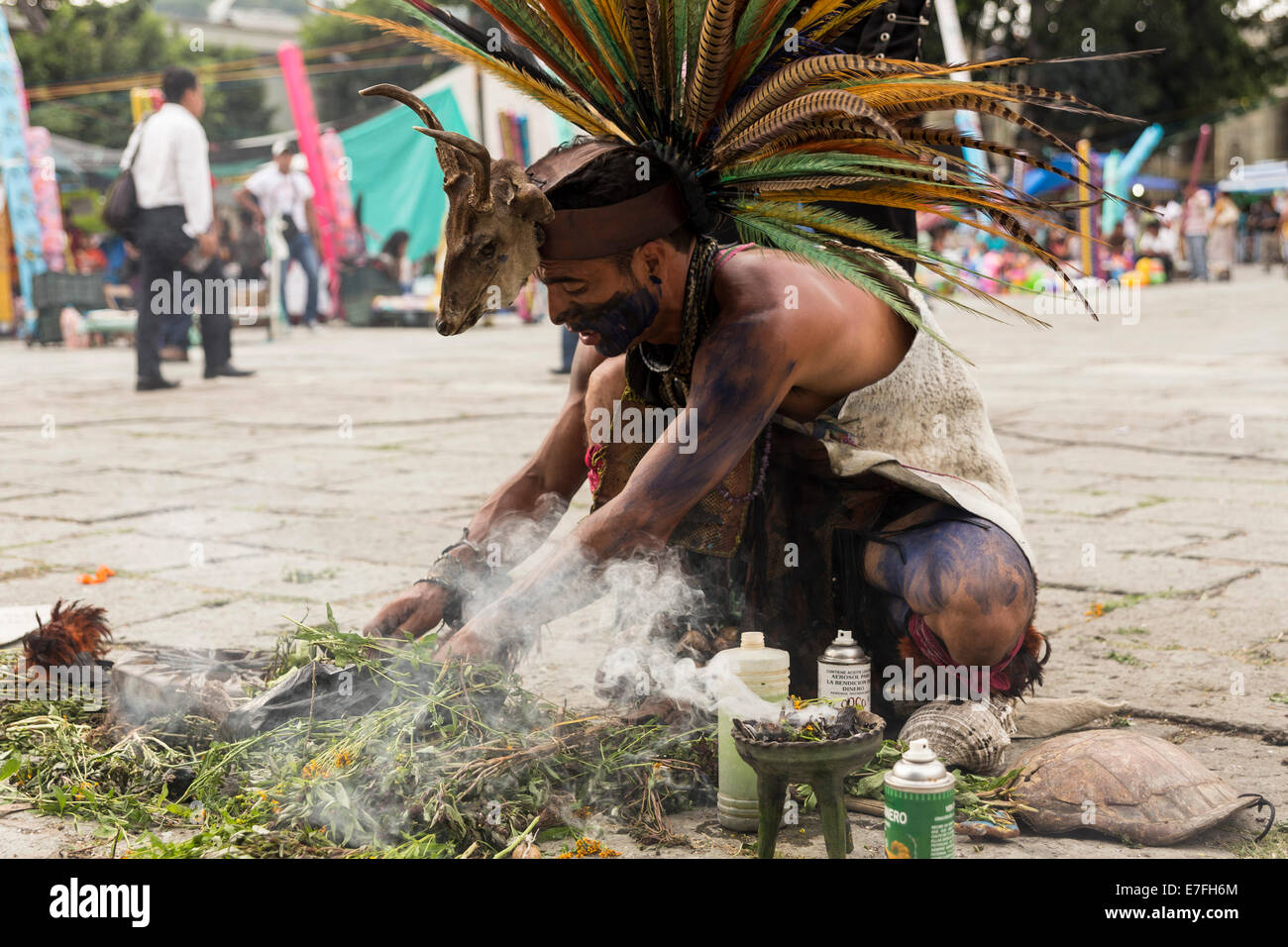 Healer practicing a ritual in Oaxaca's Zocalo, Mexico Stock Photo - Alamy