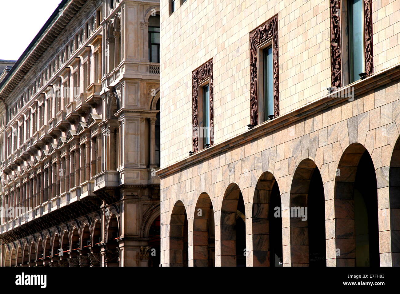 Architectural details of buildings facing Duomo square in Milan, Italy ...
