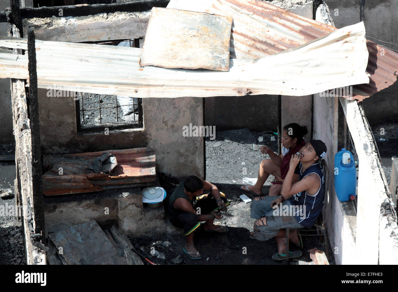 Paranaque City, Philippines. 16th Sep, 2014. Residents take shelter ...