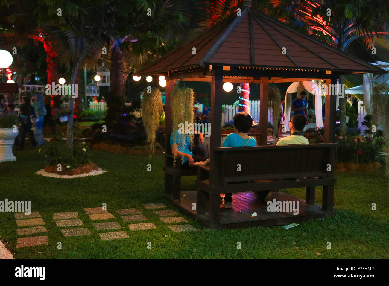 Family resting in a wooden hut during their night visiting the FLORIA ...