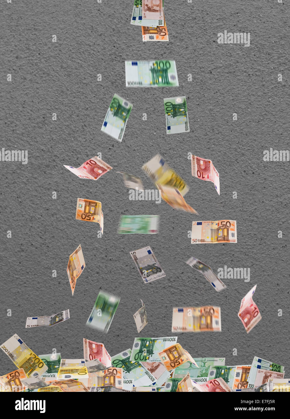 falling of euro currency on the gray background Stock Photo - Alamy