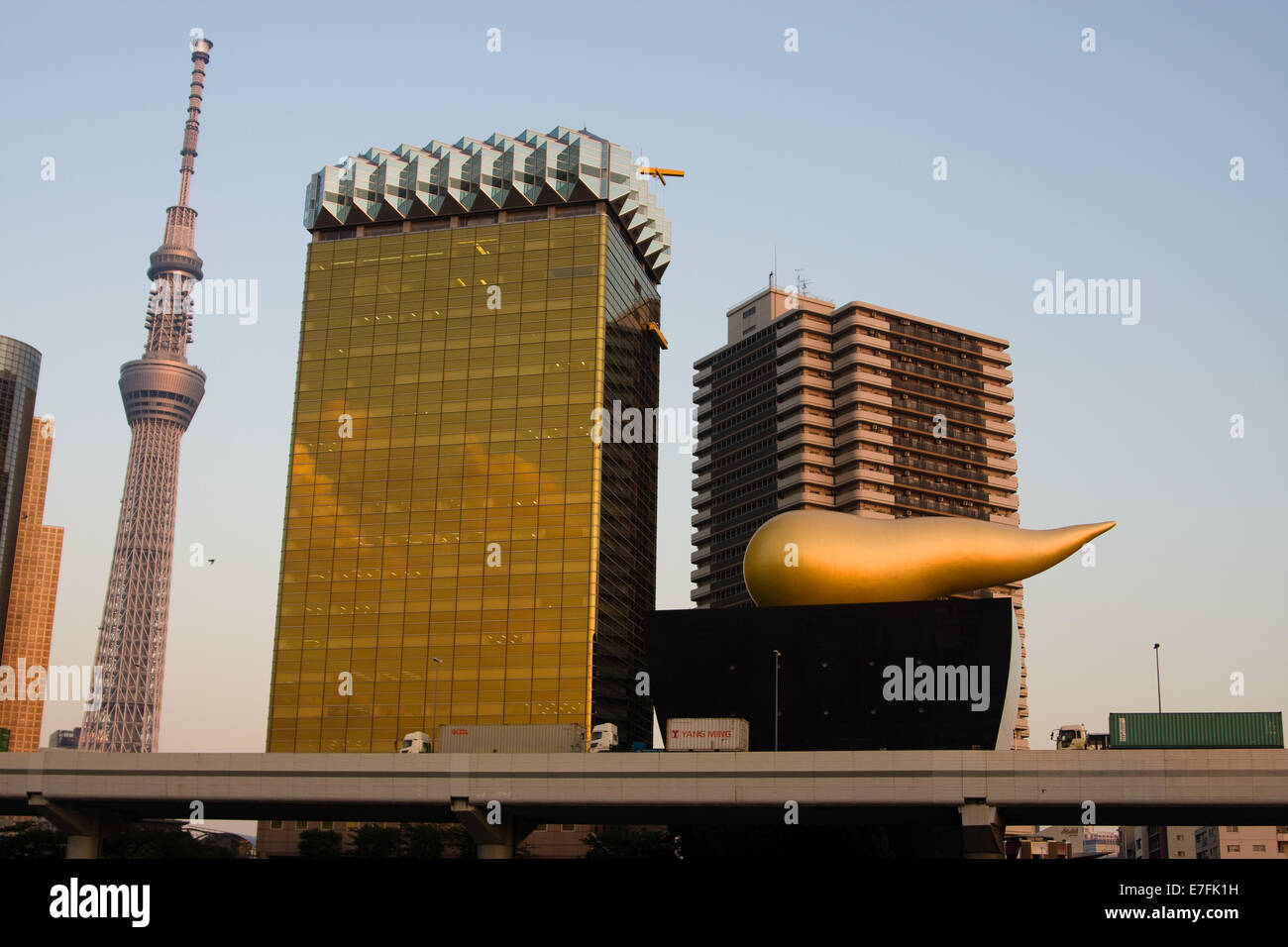 Asahi Beer Hall in Sumida, Tokyo, Japan with the Skytree Tower in the ...