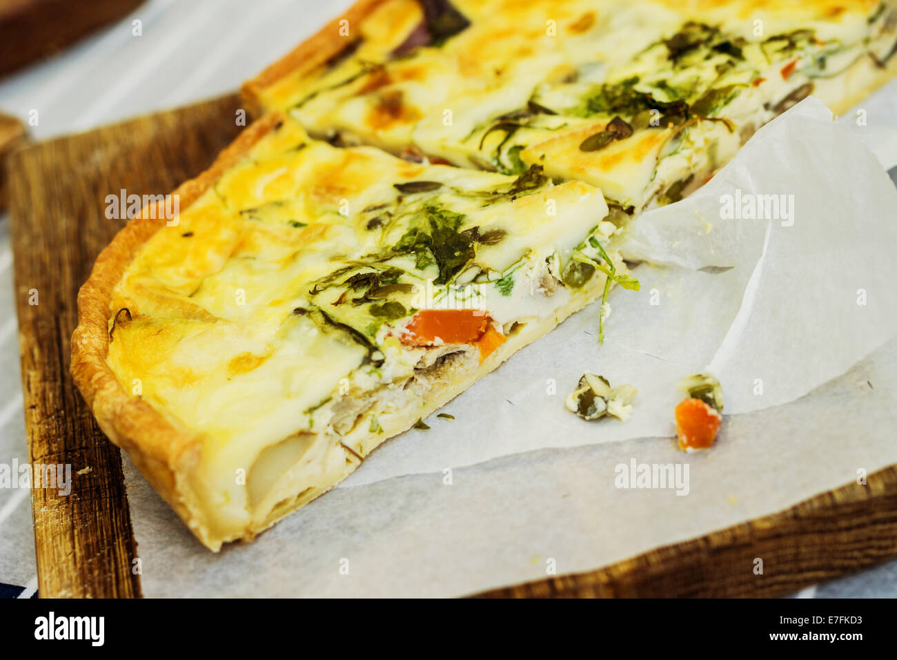 Quiche lorraine on a wooden slate Stock Photo - Alamy