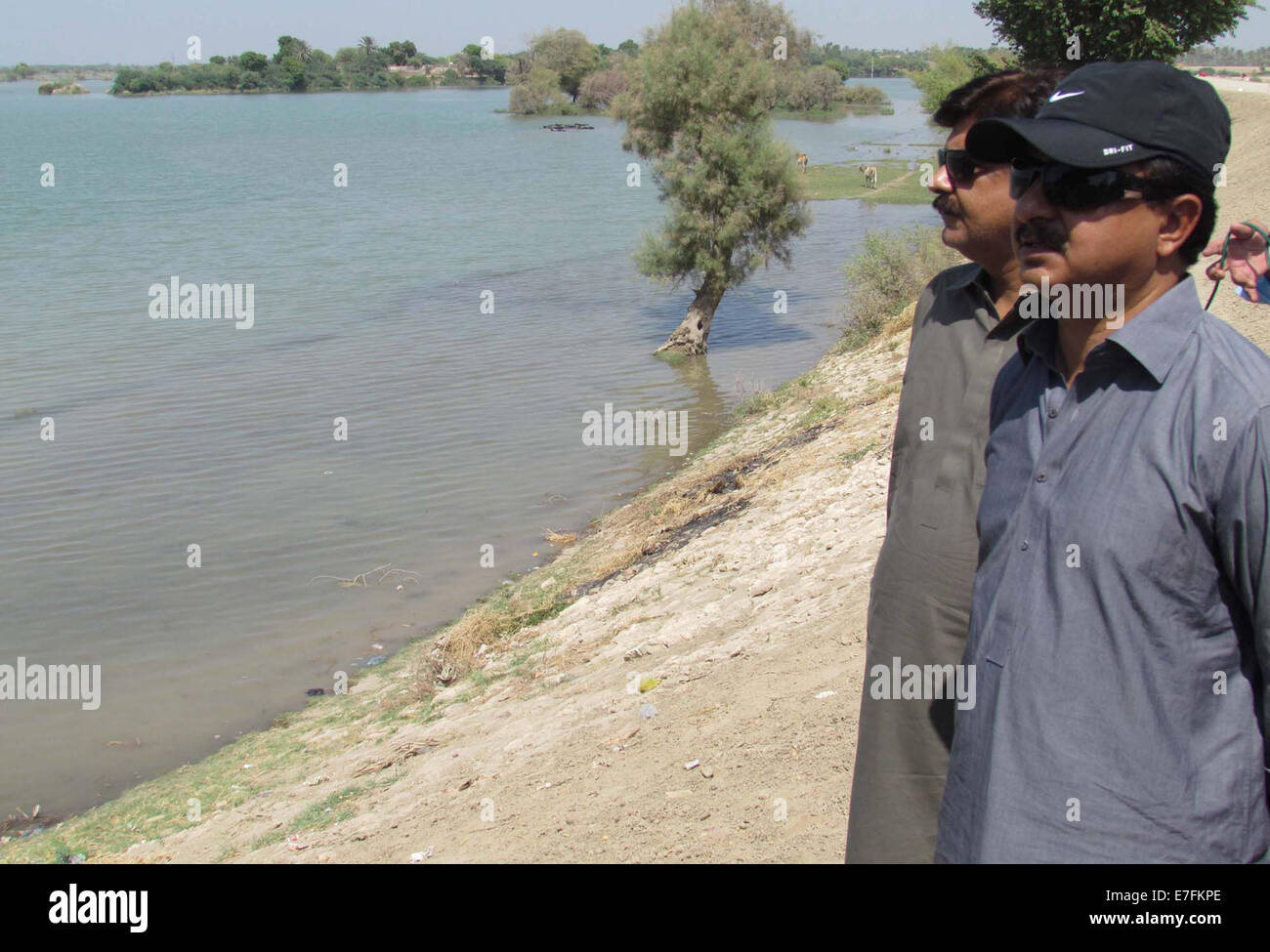 PML (Q) leader Haleem Adil Sheikh viewing water flow during his visit ...