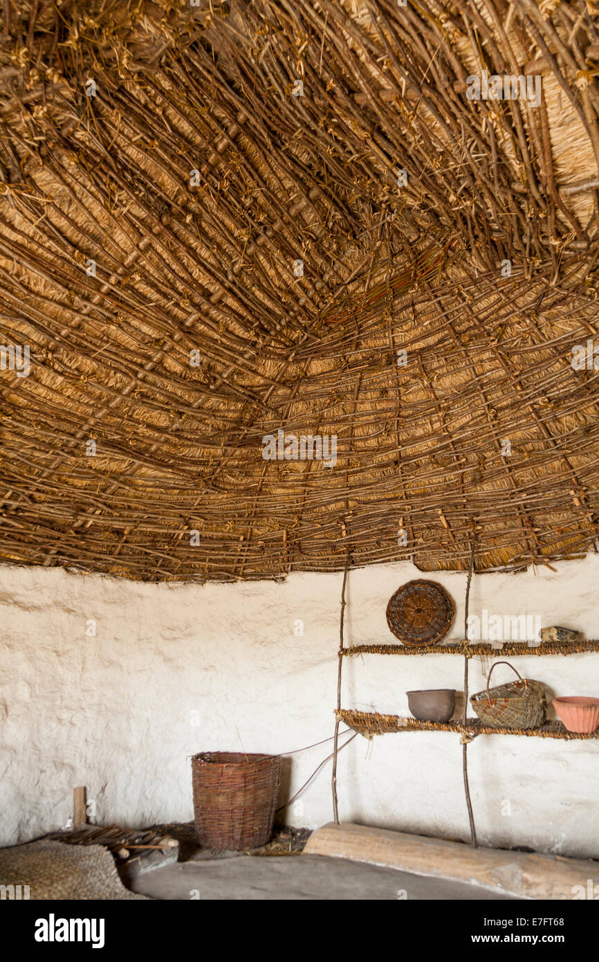 Thatched roof ceiling inside a recreated Neolithic stone age hut ...