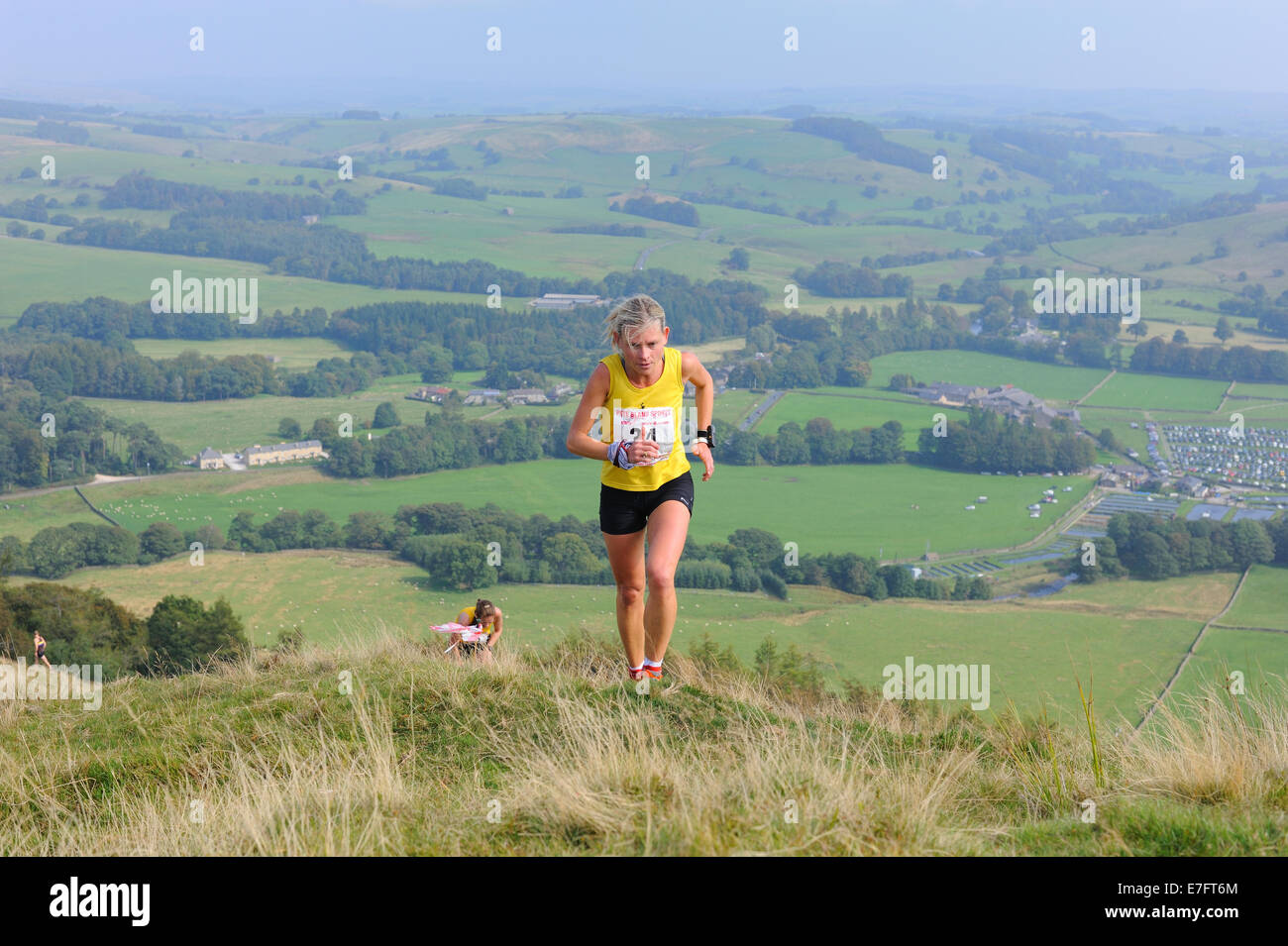 Lady Fell runner running up hill at a country show fell race Stock ...