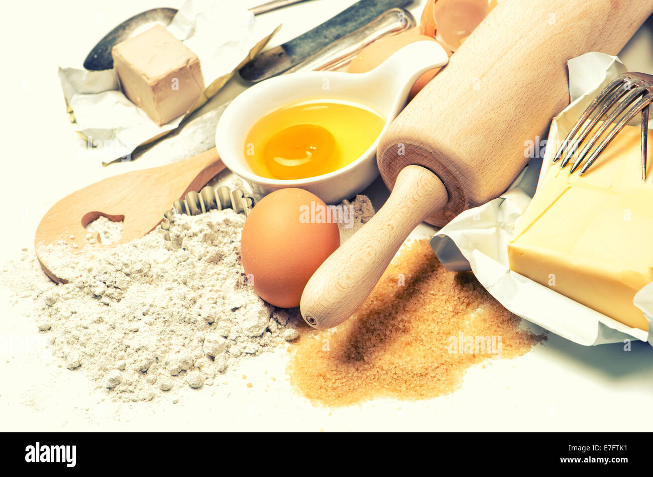 baking ingredients eggs, flour, sugar, butter, yeast. food background ...