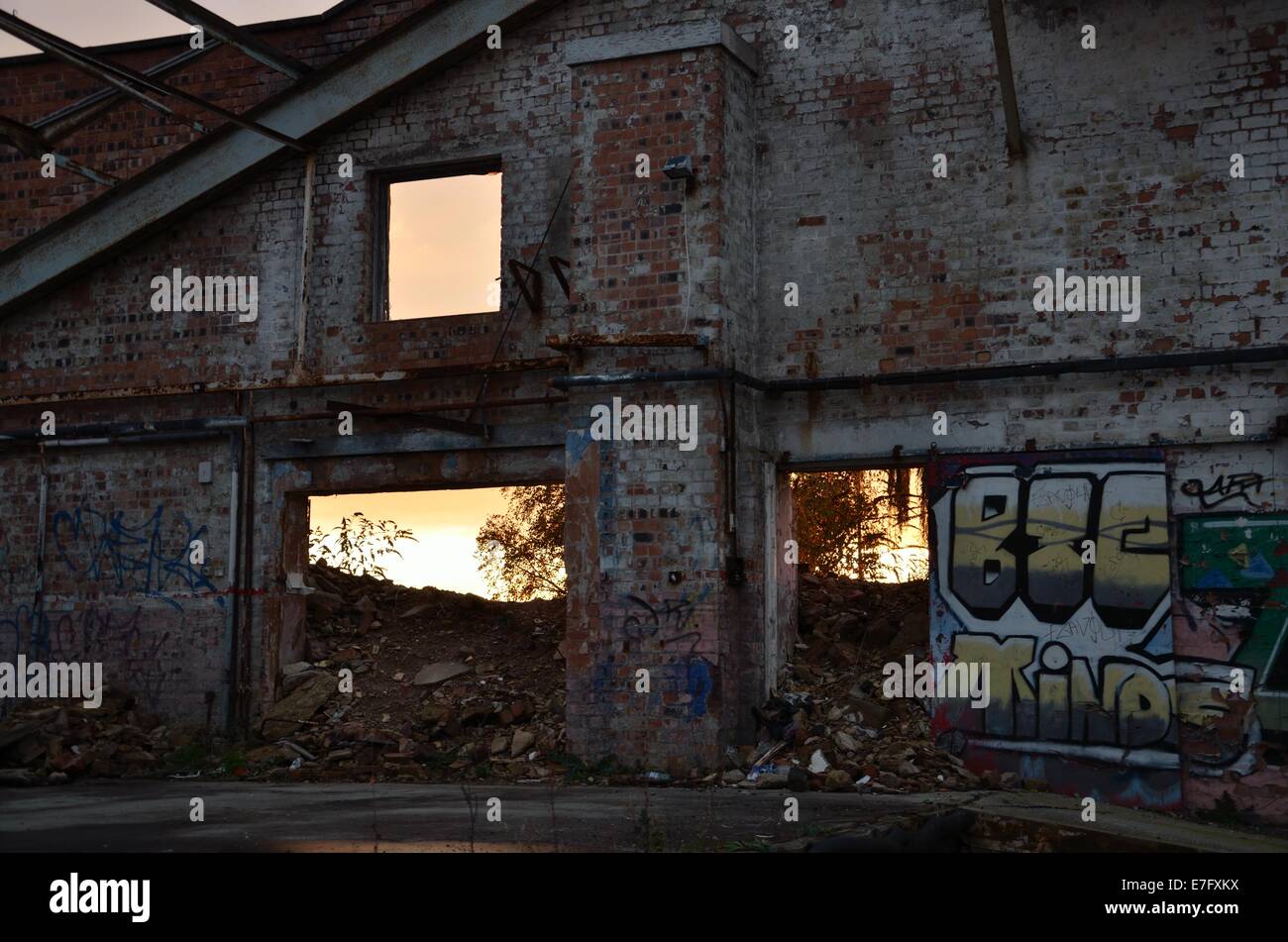 Derelict factory scene at dusk Stock Photo - Alamy