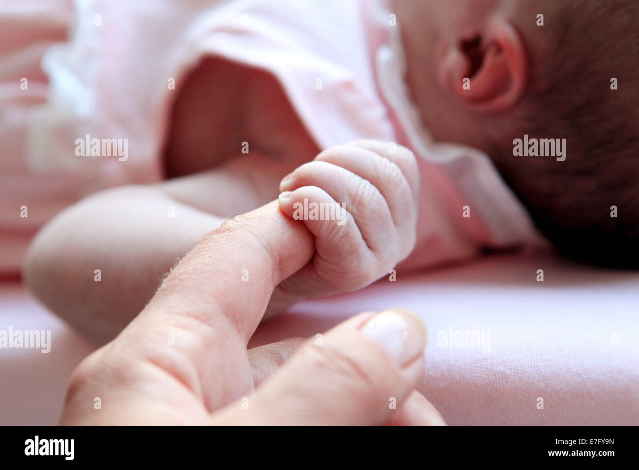 The image of hands of parents and the child Stock Photo - Alamy