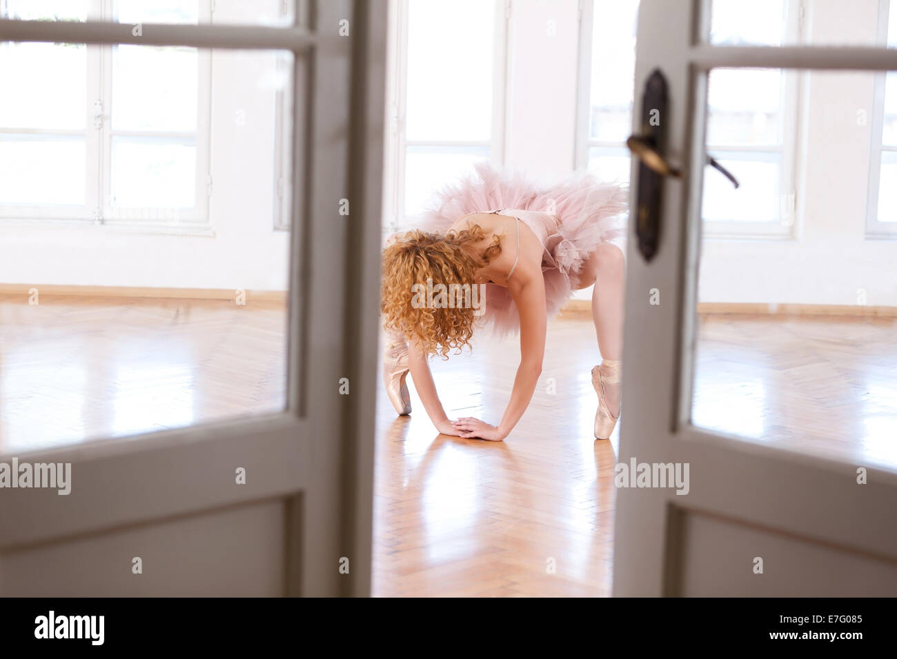 Ballerina performing a difficult position Stock Photo - Alamy