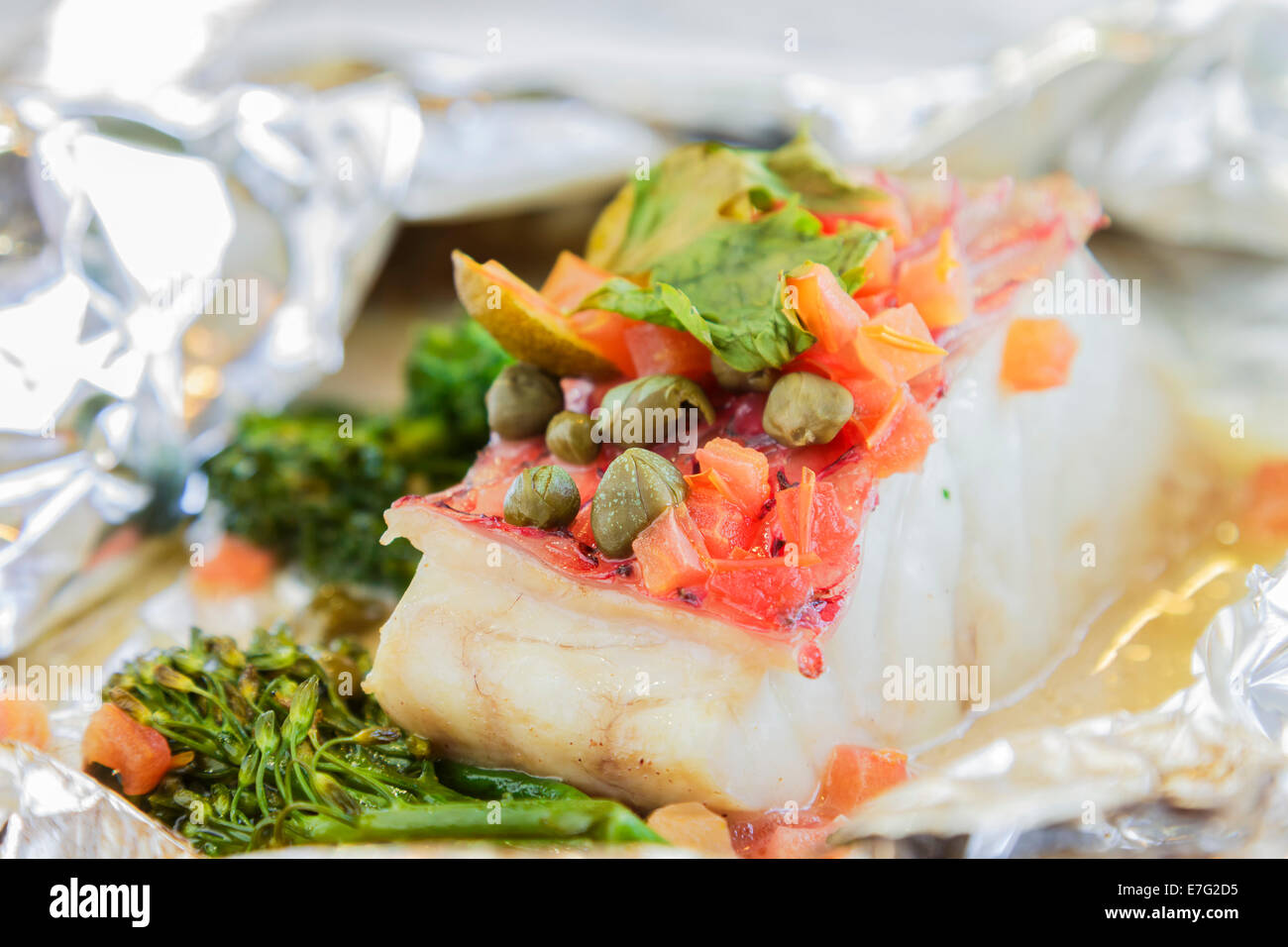 Hawaiian pink snapper cooked in a white wine butter sauce with ...