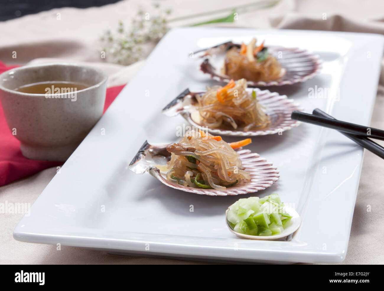 Korean noodles on a shell Stock Photo - Alamy