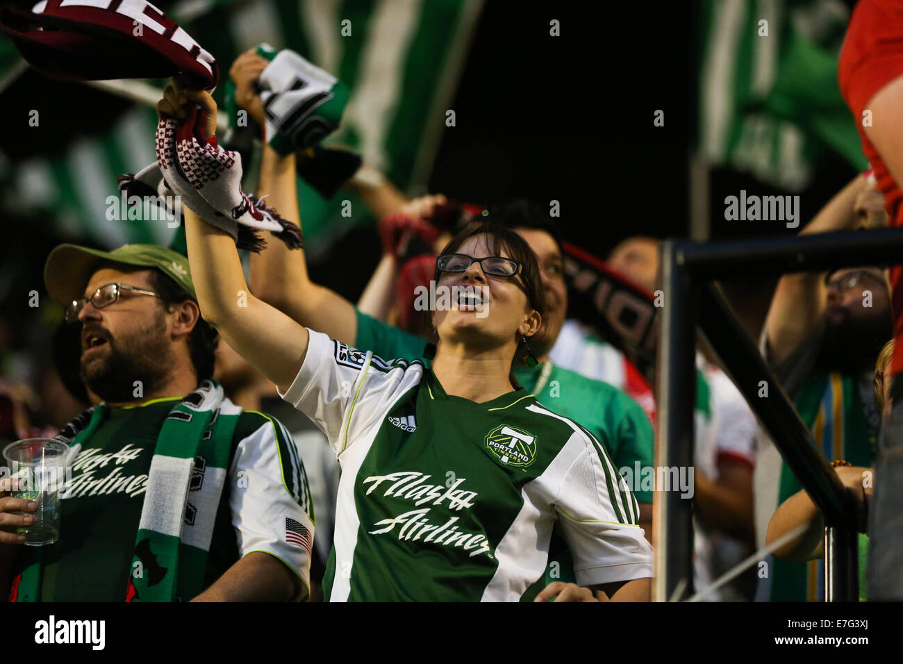 Fans in the Timbers Army celebate a goal. The Portland Timbers play ...