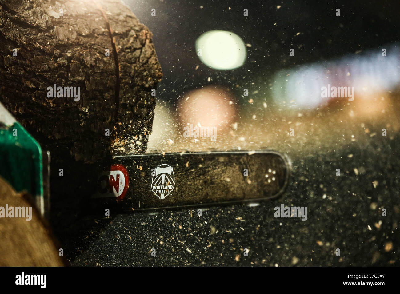 TIMBER JOEY cuts a log slice. The Portland Timbers play Olimpia at ...