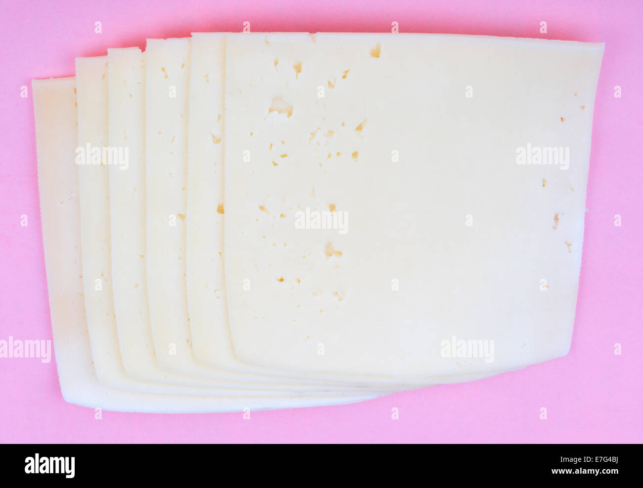 Cheese on Pink Background Stock Photo - Alamy