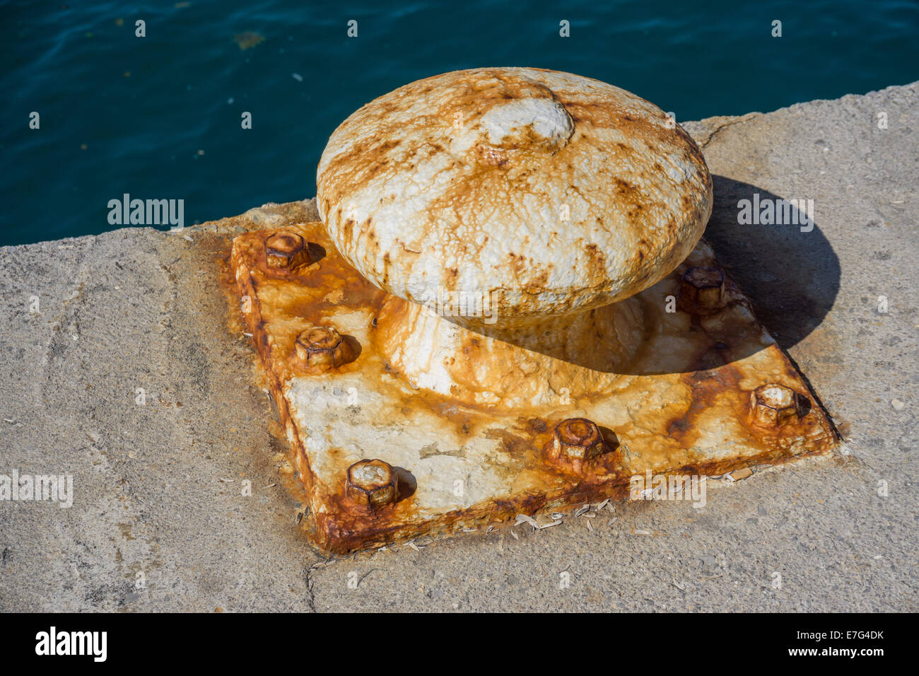 Run-down Metal ship moorings clooseup Stock Photo - Alamy