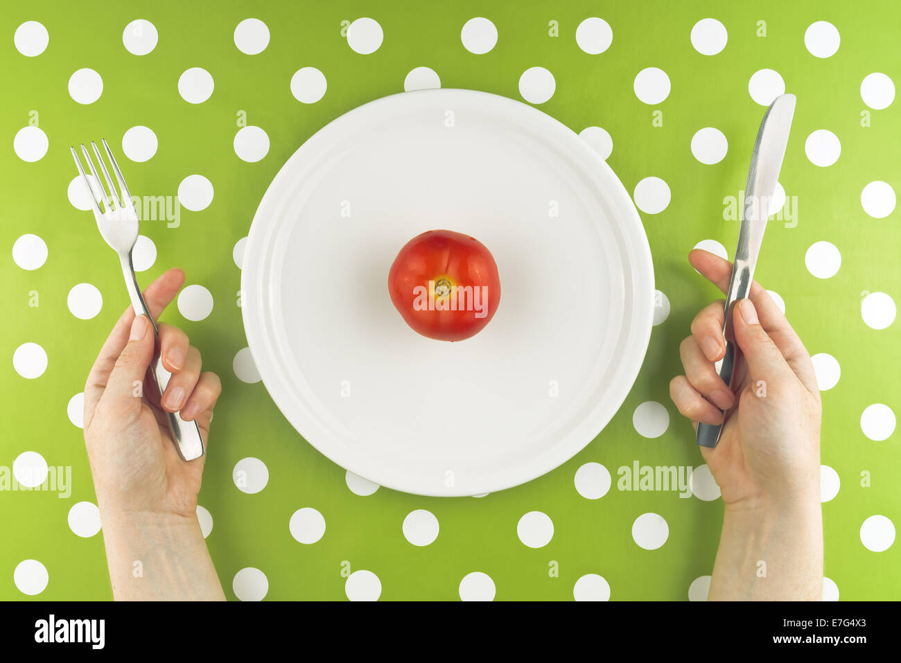 Woman eating a tomato hi-res stock photography and images - Alamy