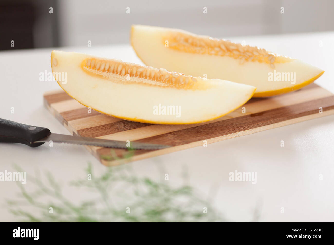 Cutting melon hi-res stock photography and images - Alamy