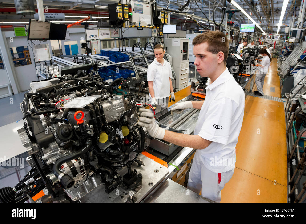Man working on the production line of the Audi A3 at the Audi plant ...