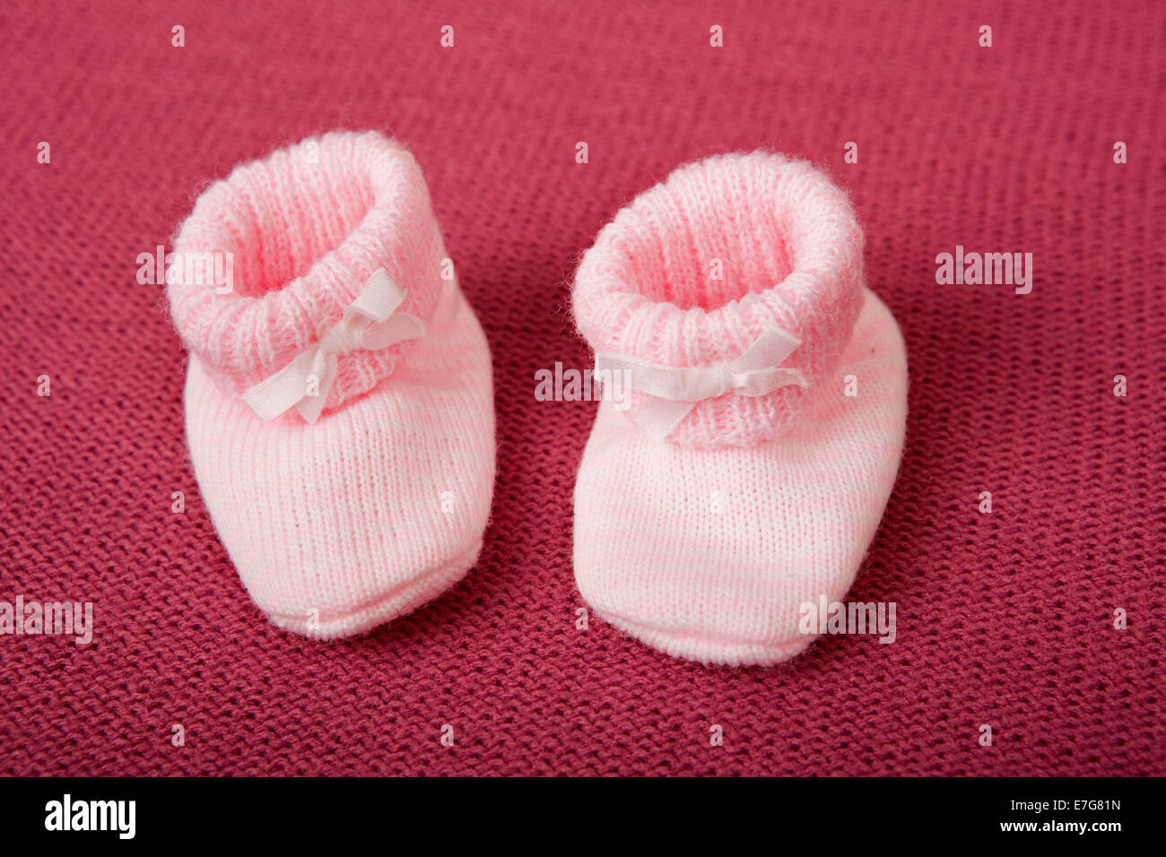 pink baby booties detail Stock Photo - Alamy