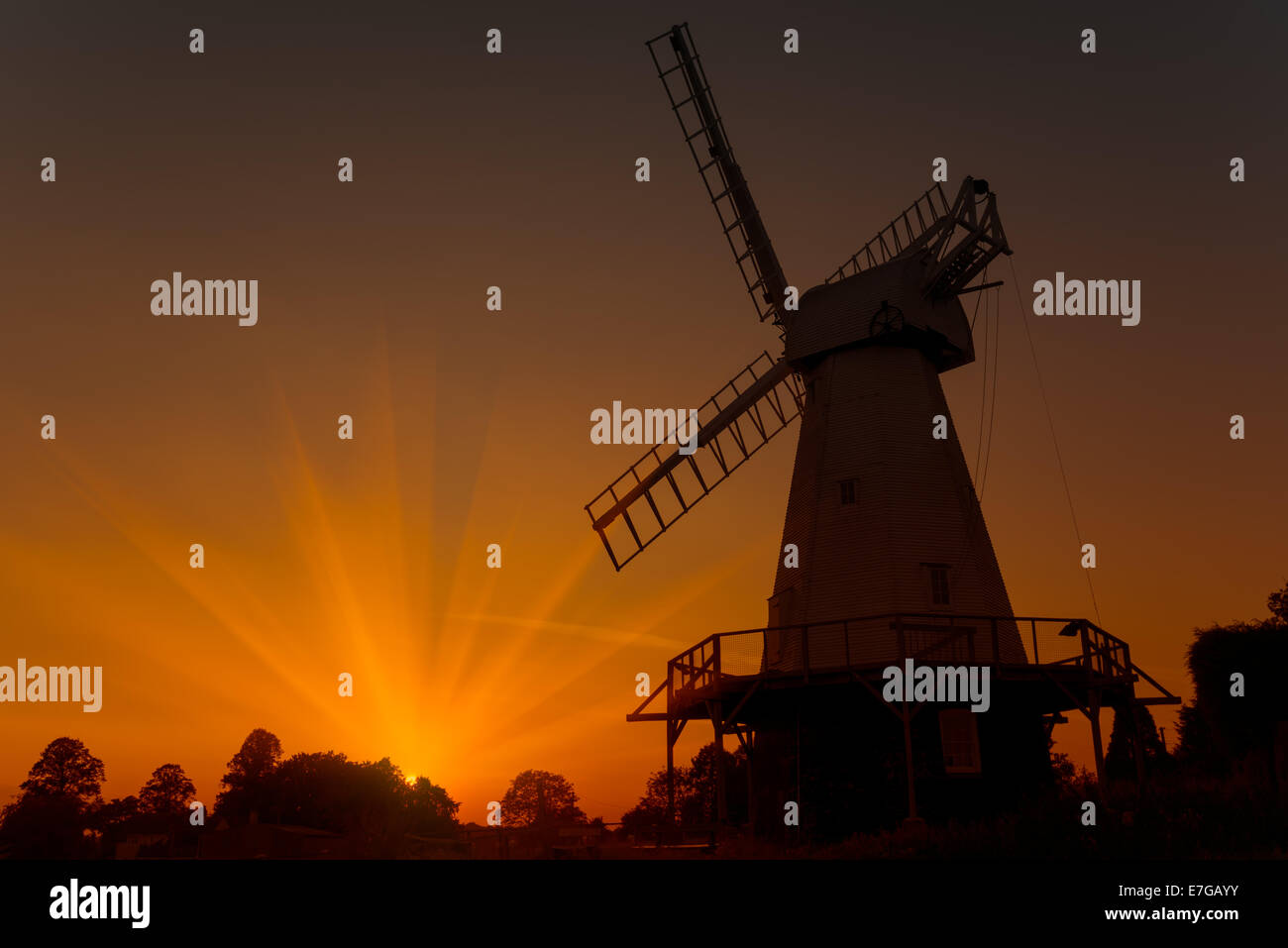 Sunset silhouette of Woodchurch windmill in Kent Stock Photo - Alamy