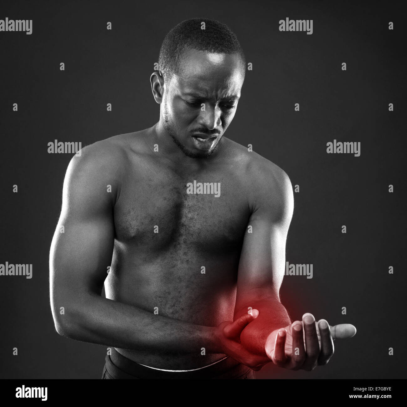 African man checking pulse over black background Stock Photo - Alamy