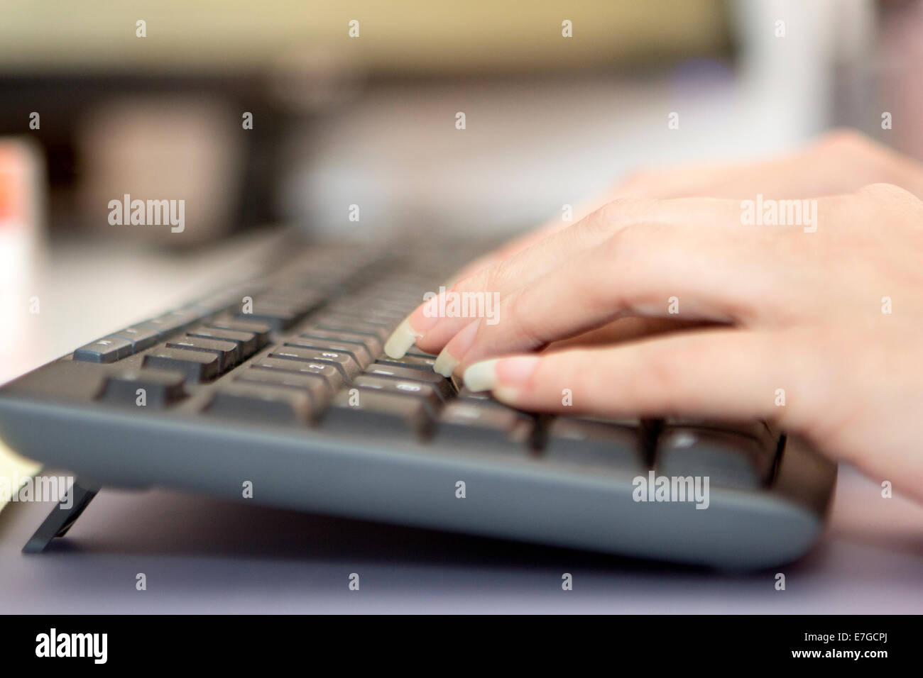 Women hands on black computer hi-res stock photography and images - Alamy