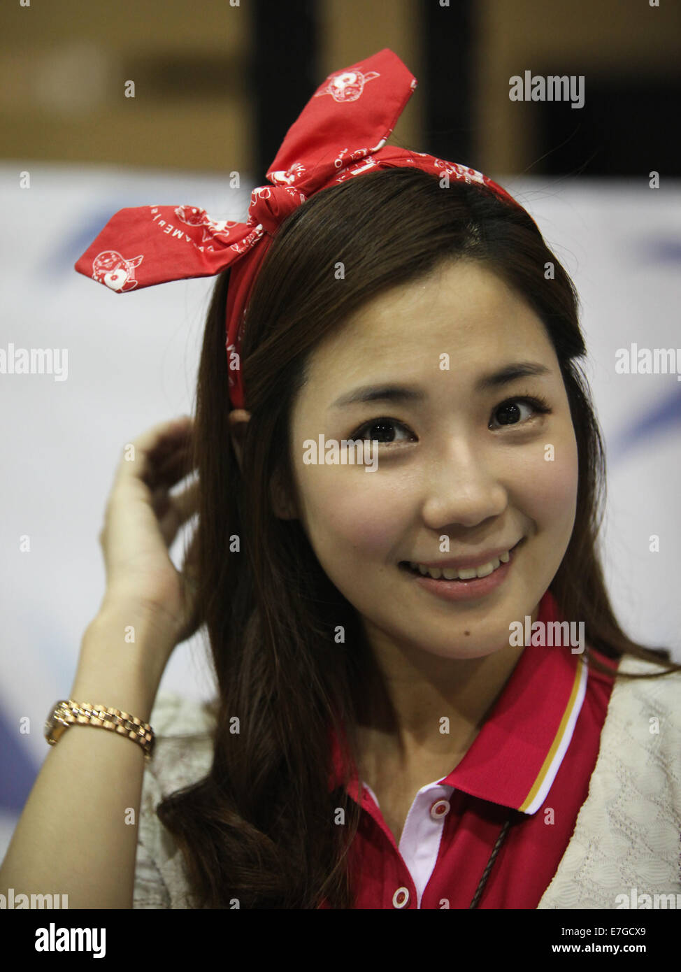 Incheon, South Korea. 17th Sep, 2014. A girl who works in the gift shop ...