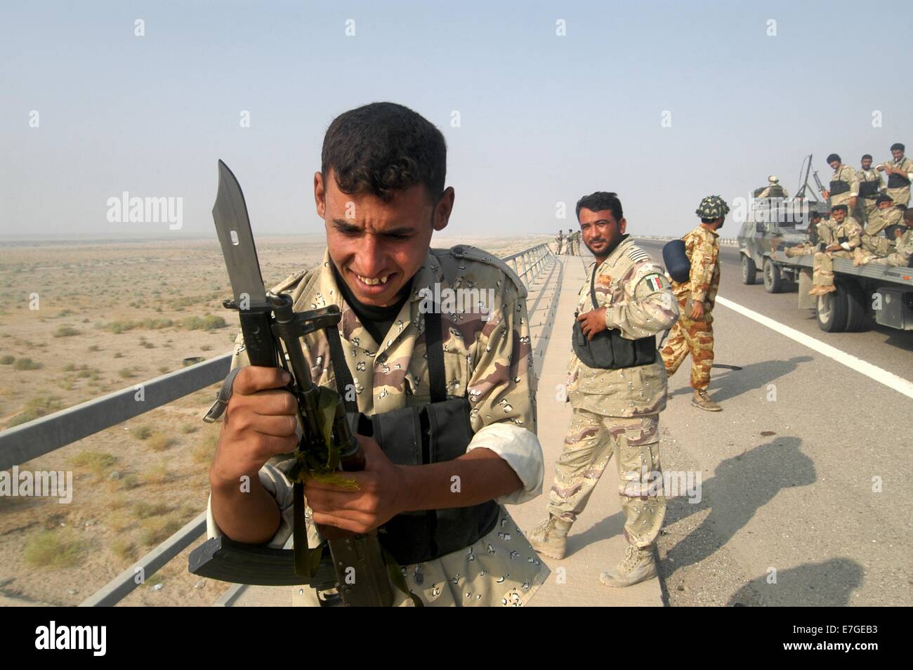 Patrol of the New Iraqi Army on the highway from Baghdad to Basra, near ...