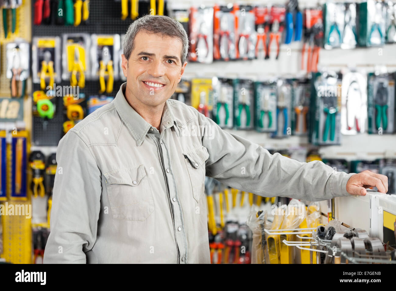Mature store owner standing hi-res stock photography and images - Alamy