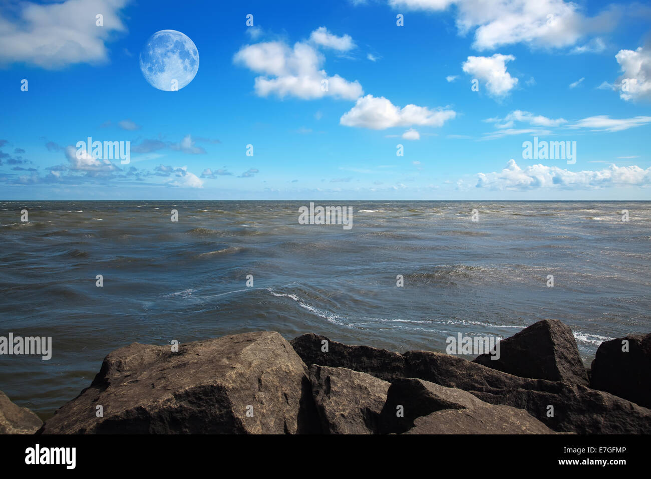 full moon over the ocean Stock Photo - Alamy