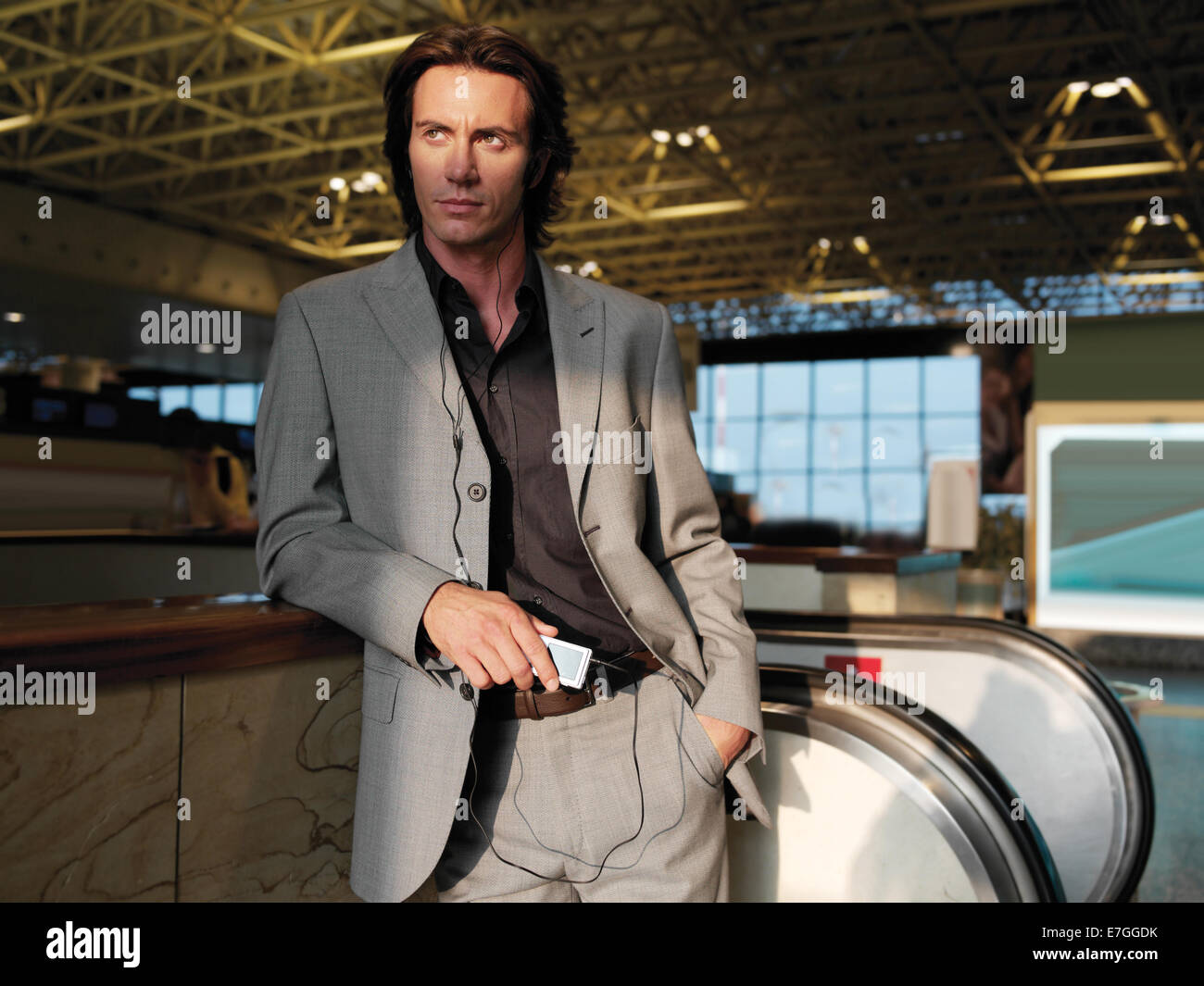 man listening to music with mp3 walkman Stock Photo - Alamy