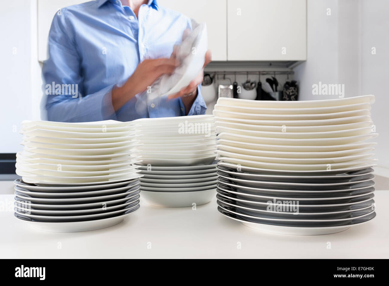 Man washing dishes in kitchen hi-res stock photography and images - Alamy