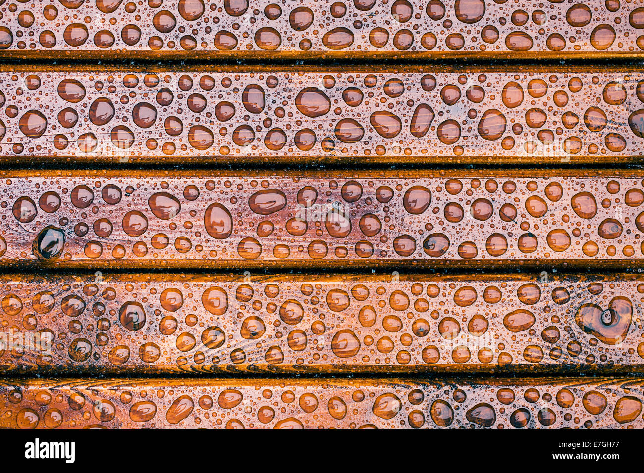 the water drops on wooden garden table Stock Photo - Alamy