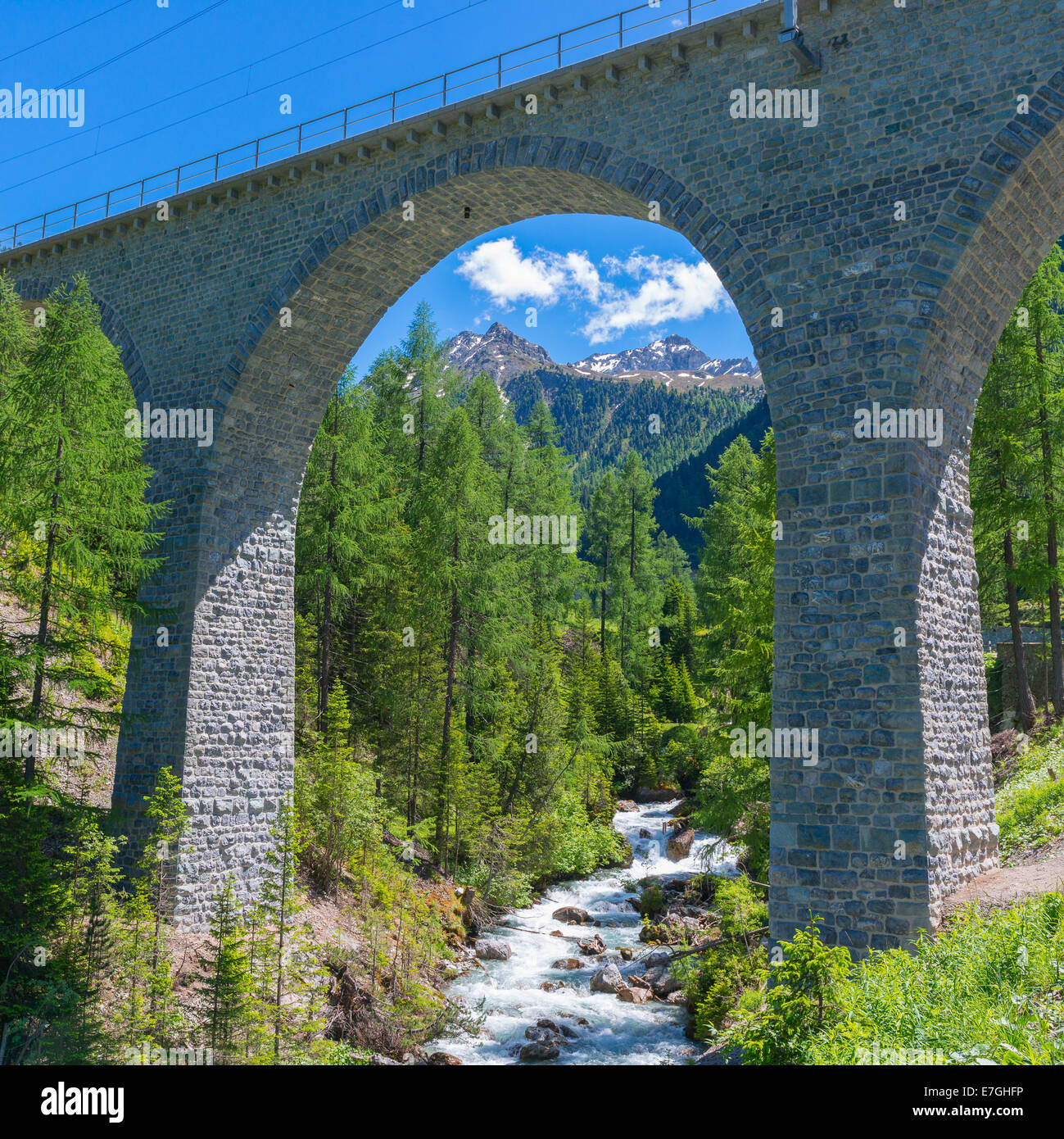 Swiss Alps stone bridge of the Albula Railway. Unesko World Heritage ...