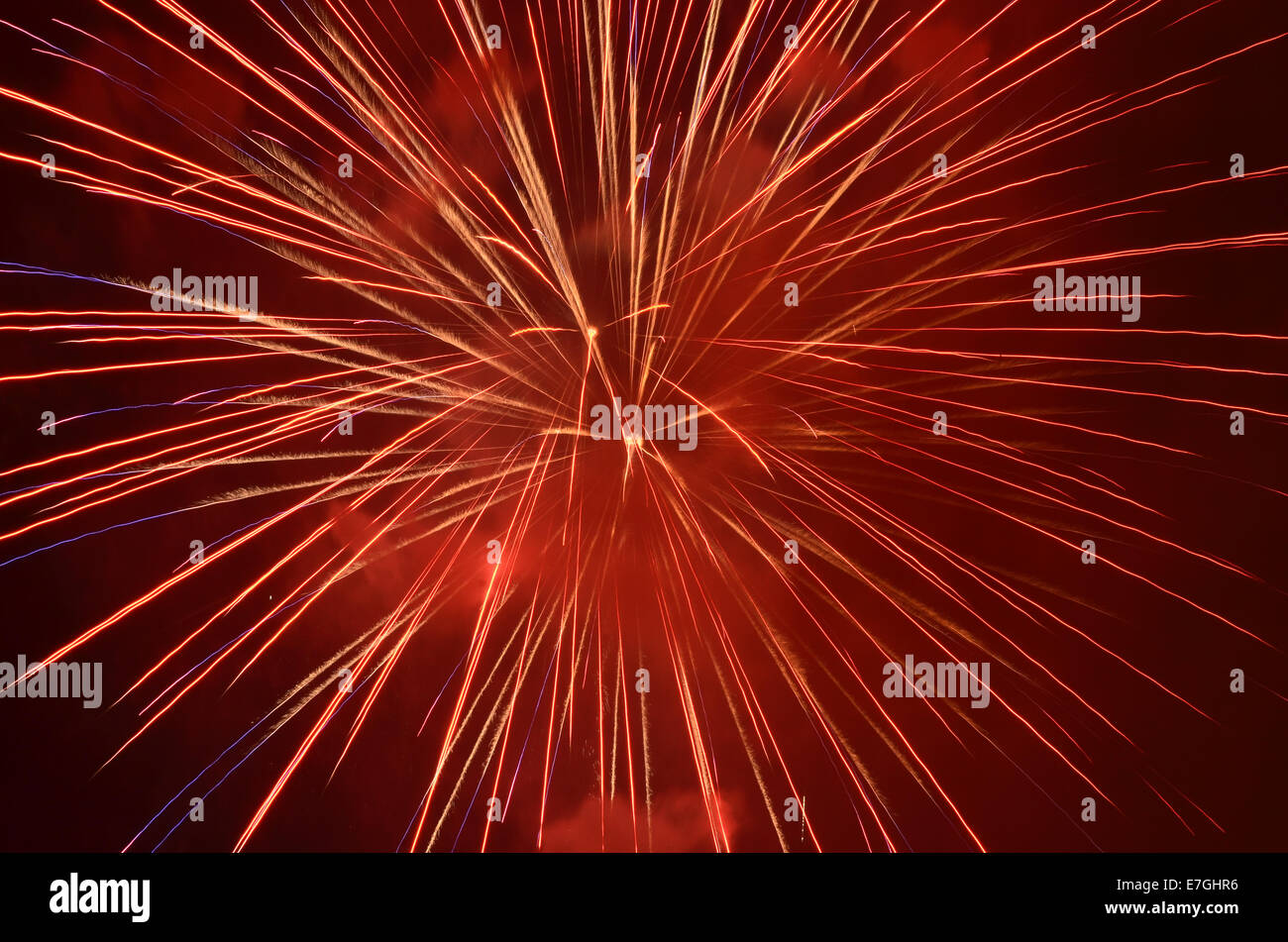 red firework in night sky Background Stock Photo - Alamy