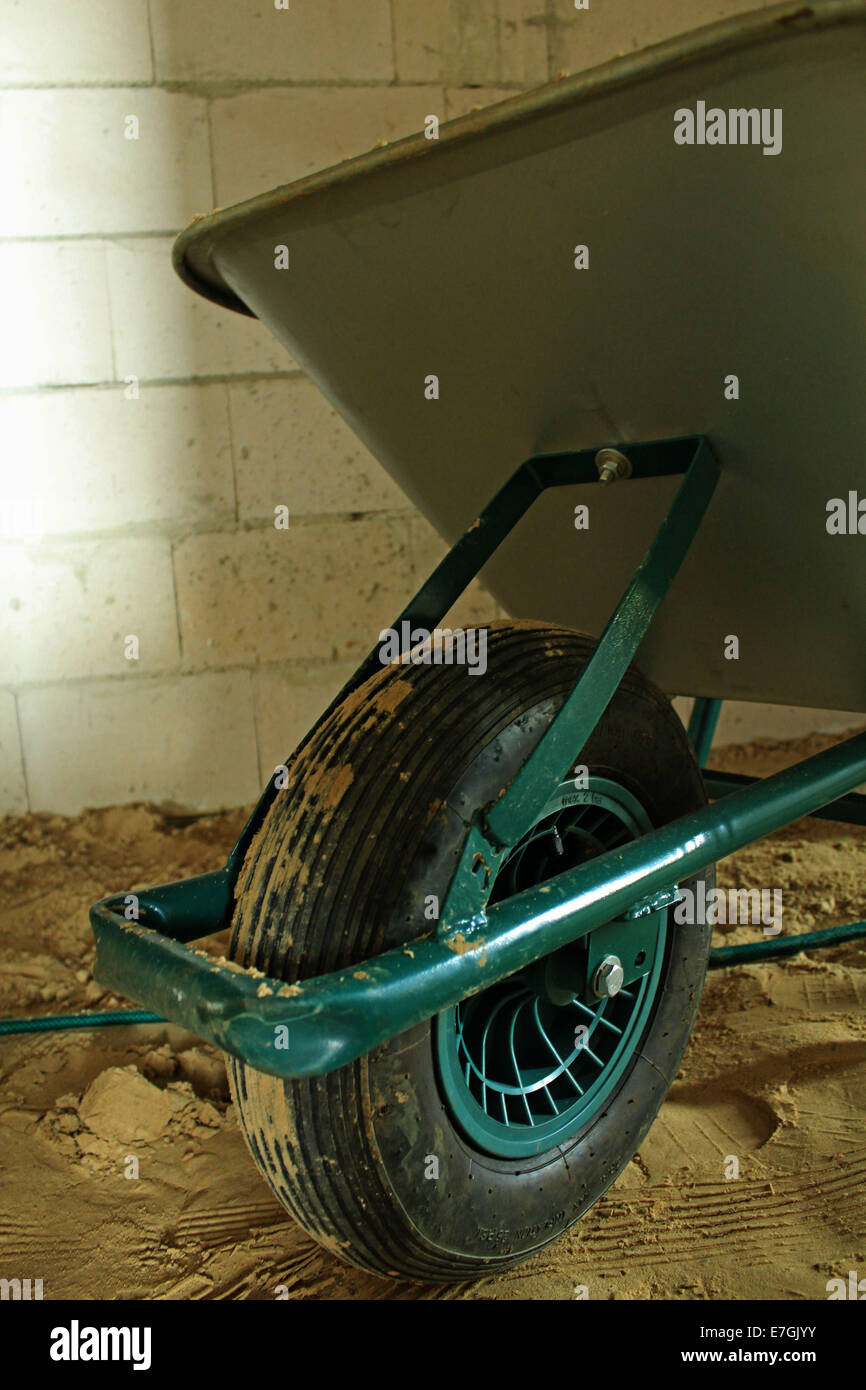 Construction pushing wheelbarrow hi-res stock photography and images ...