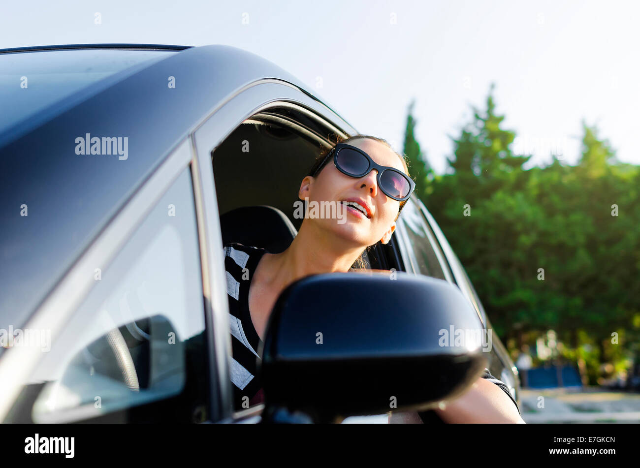 Beautiful girl drives in car hi-res stock photography and images - Alamy