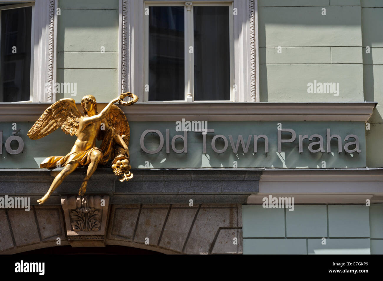 An angel sculpture on the wall of the Old Town building, Prague, Czech ...
