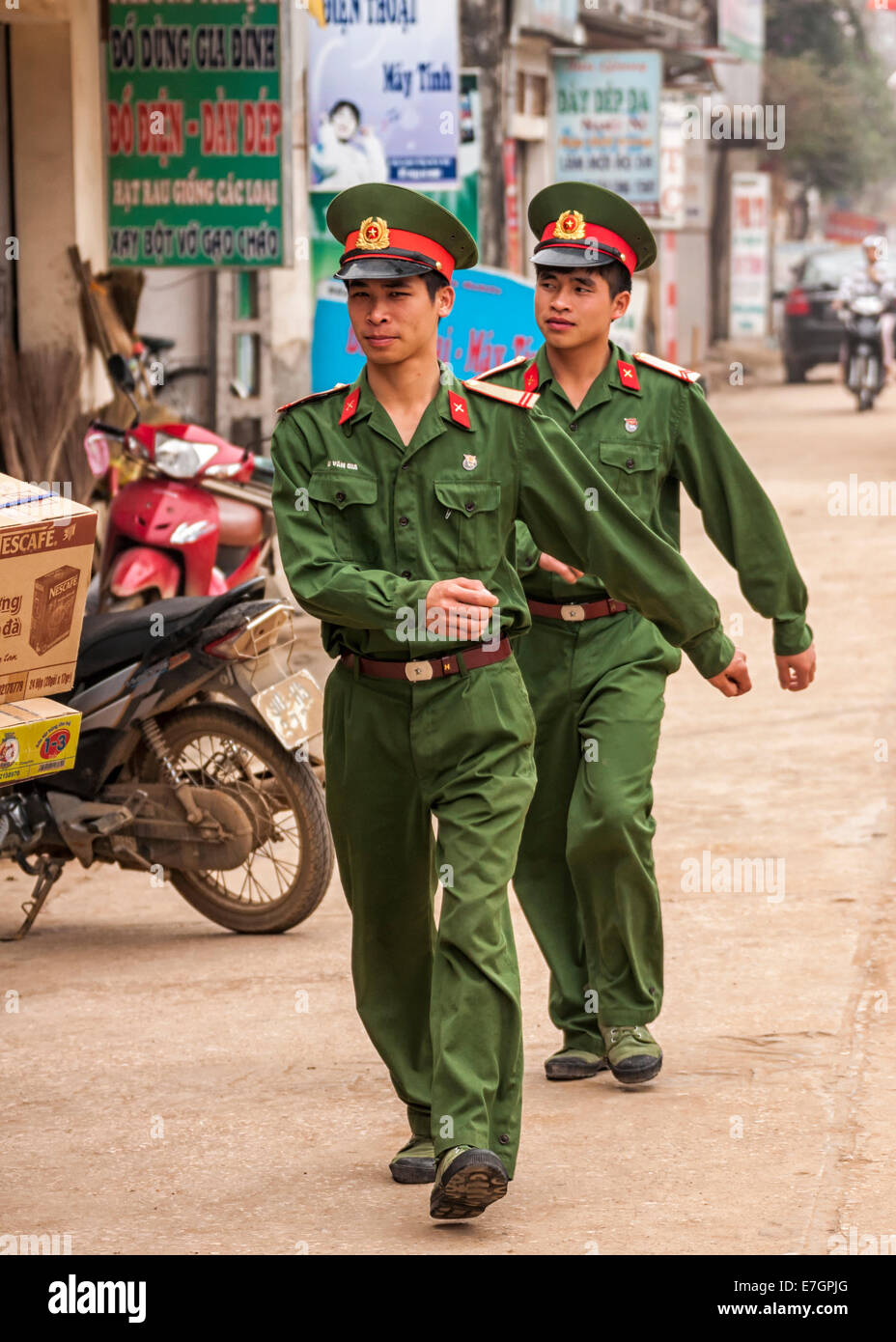 Two marching soldiers, Young men in green uniform on patrol in lockstep ...