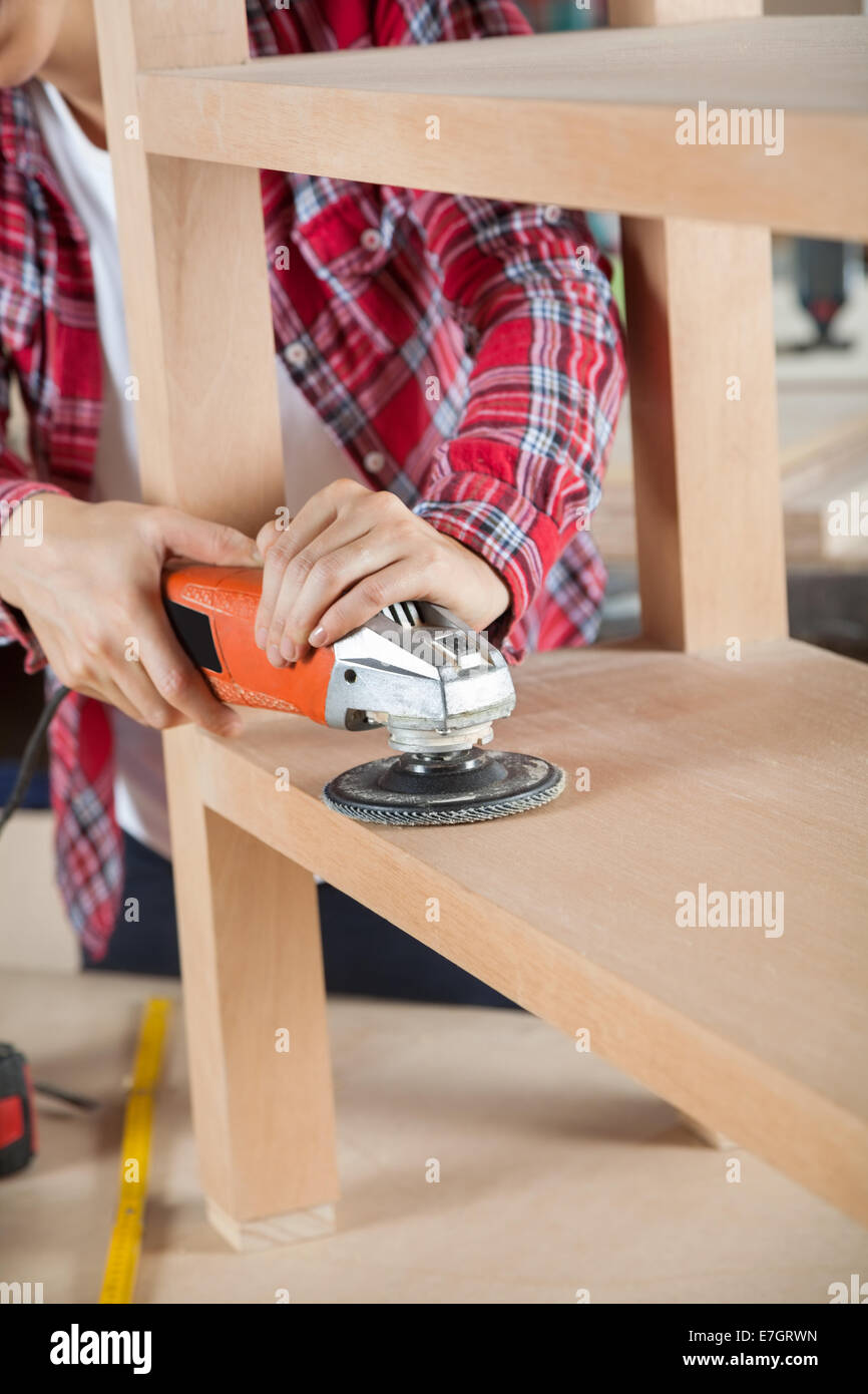 Female electric sander hi-res stock photography and images - Alamy