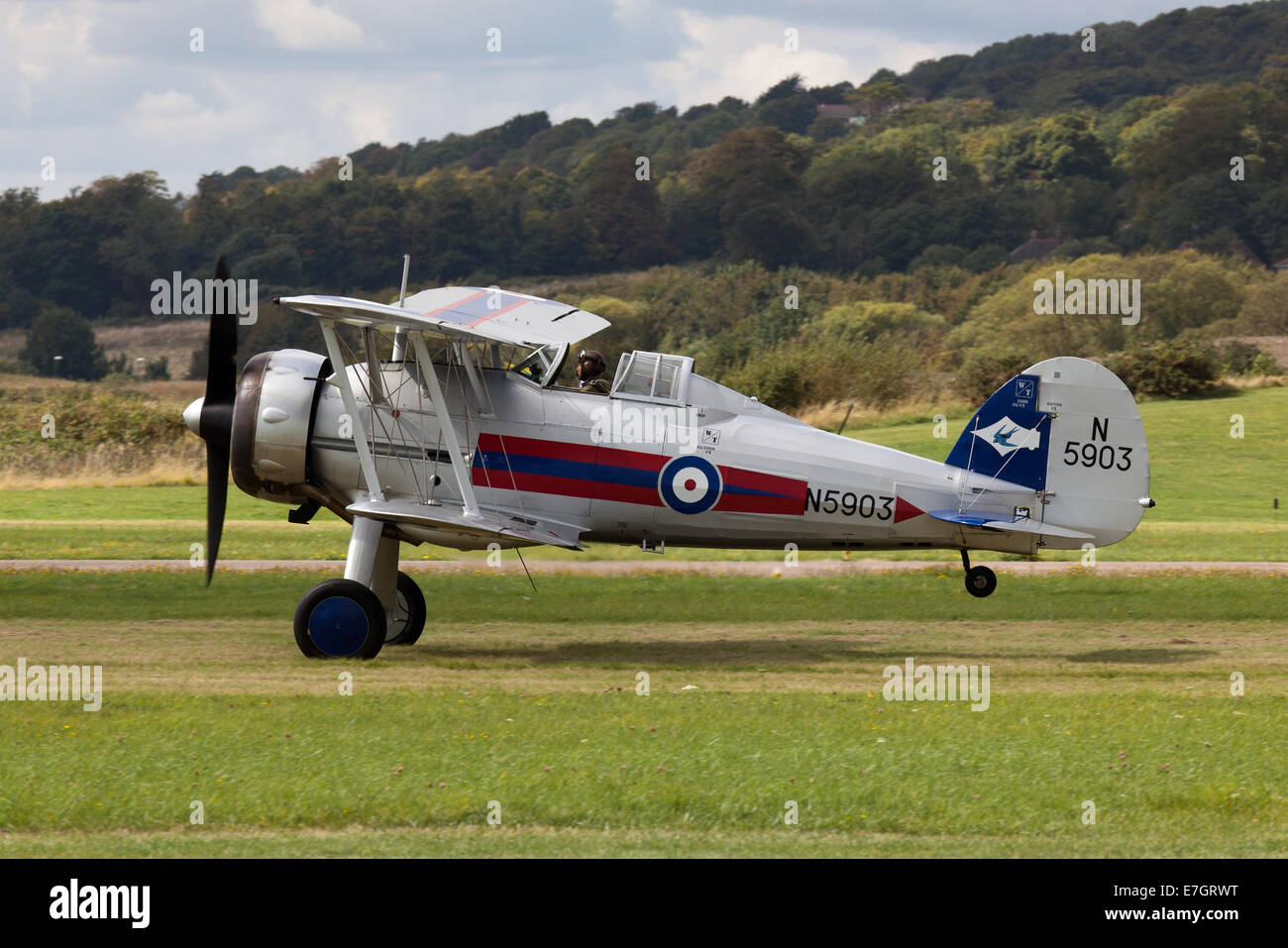 A Gloster Gladiator biplane landing at Shoreham airshow in 2014 Stock ...