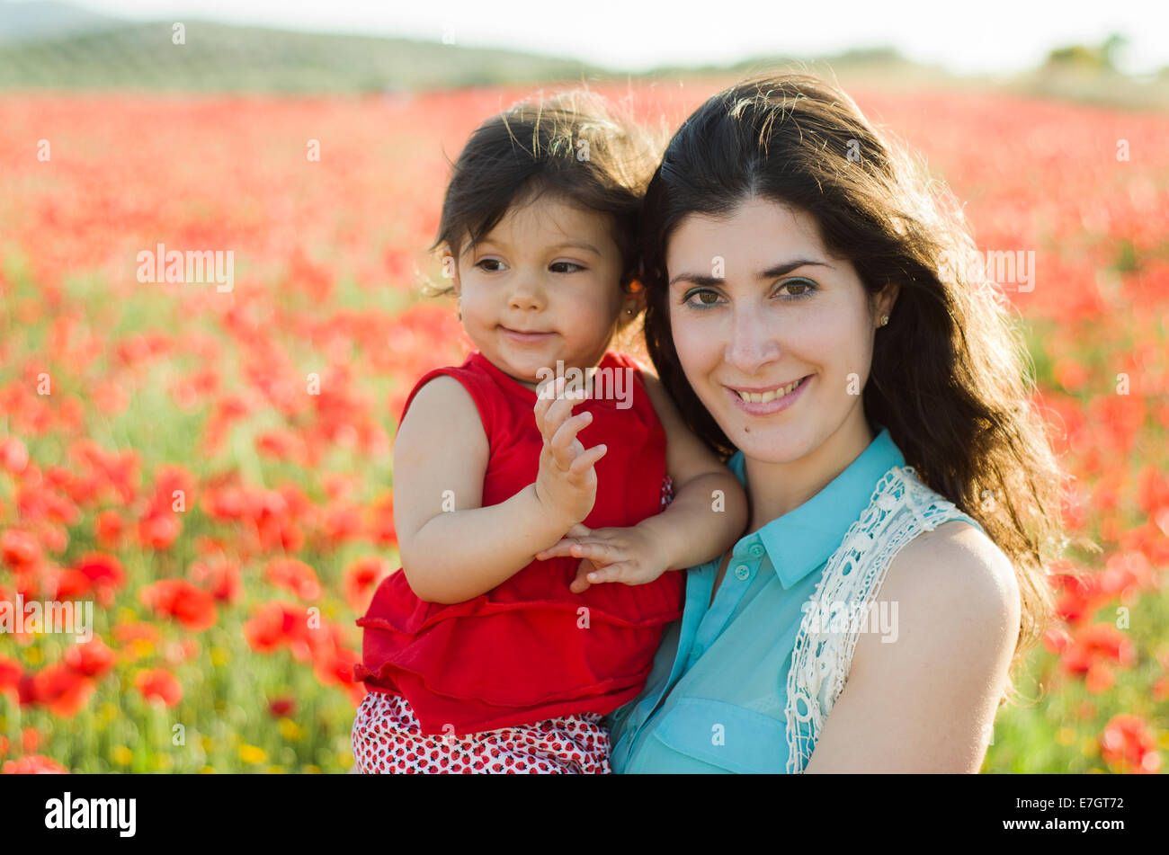 Children with poppies hi-res stock photography and images - Alamy