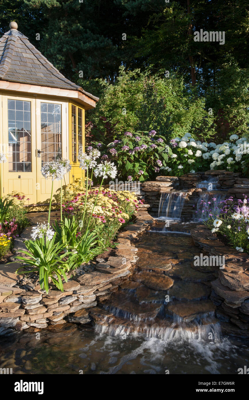 Garden - The Water Garden - summerhouse next to waterfall water feature ...