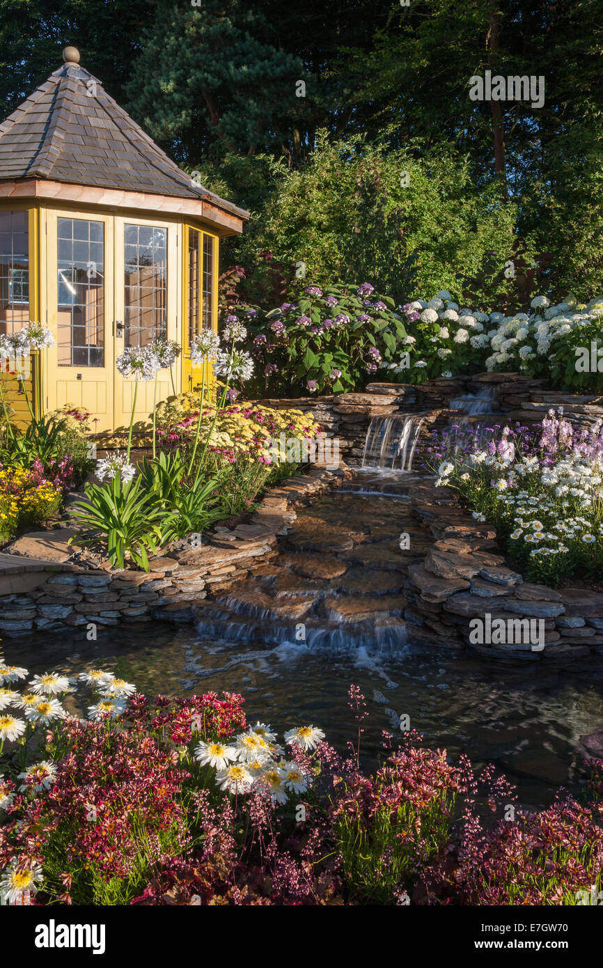 Garden - The Water Garden - summerhouse next to waterfall water feature ...