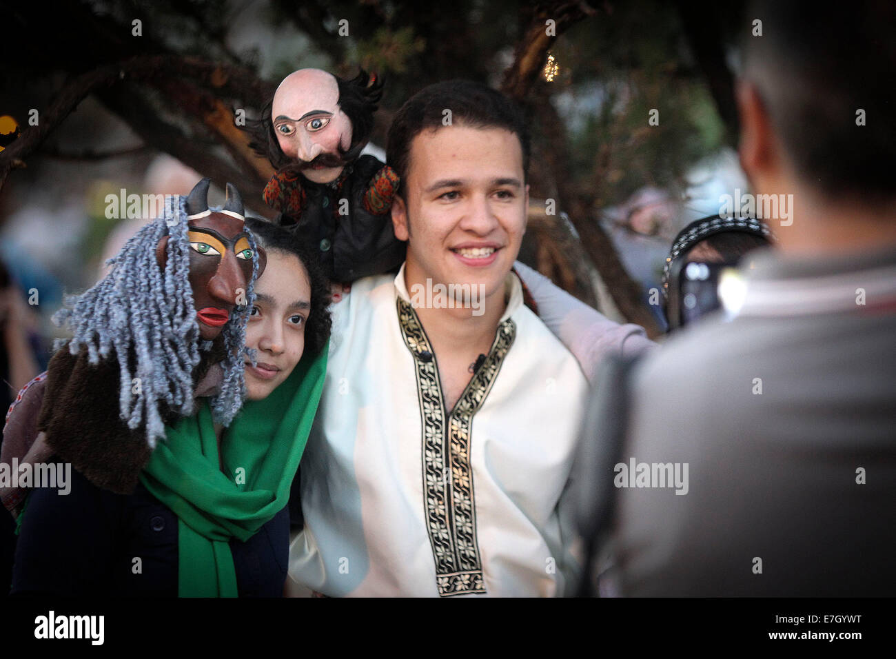 Tehran, Iran. 17th Sep, 2014. Iranian performers pose for photo beside ...