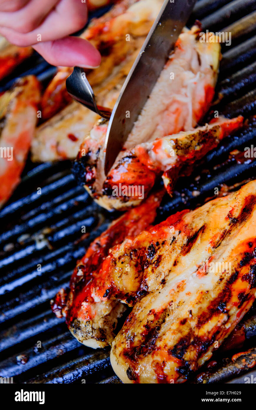 hot barbeque chicken cooking on the grill Stock Photo - Alamy