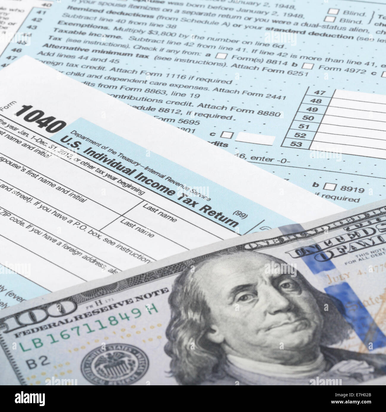 USA Tax Form 1040 with calculator and 100 US dollar bills - 1 to 1 ...