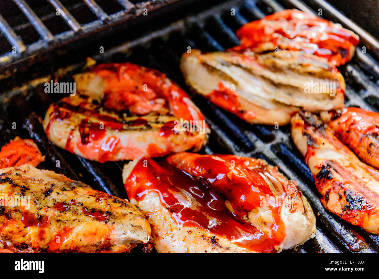 hot barbeque chicken cooking on the grill Stock Photo - Alamy